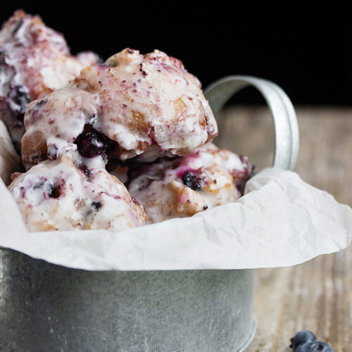 Glazed Fresh Blueberry Fritters - Seasons and Suppers