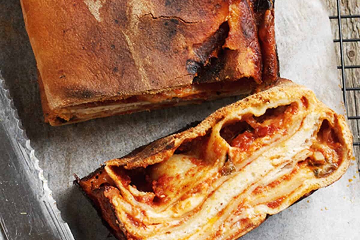 Scaccia Ragusana (Lasagna Loaf) - Seasons and Suppers