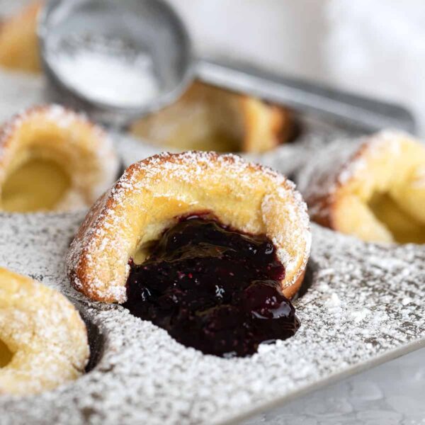 Mini Dutch Baby Pancakes with Warm Blueberry Sauce - Seasons and Suppers