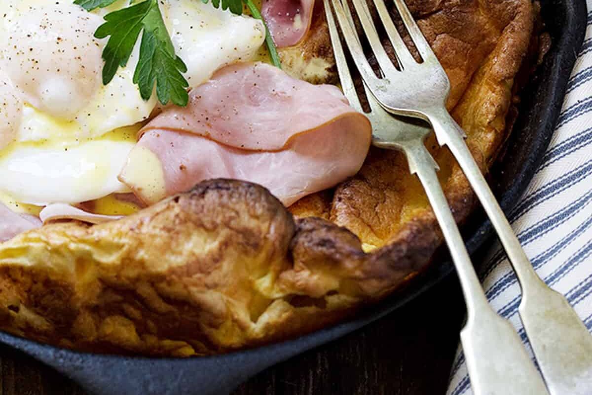 Eggs Benedict Dutch Baby - Seasons and Suppers