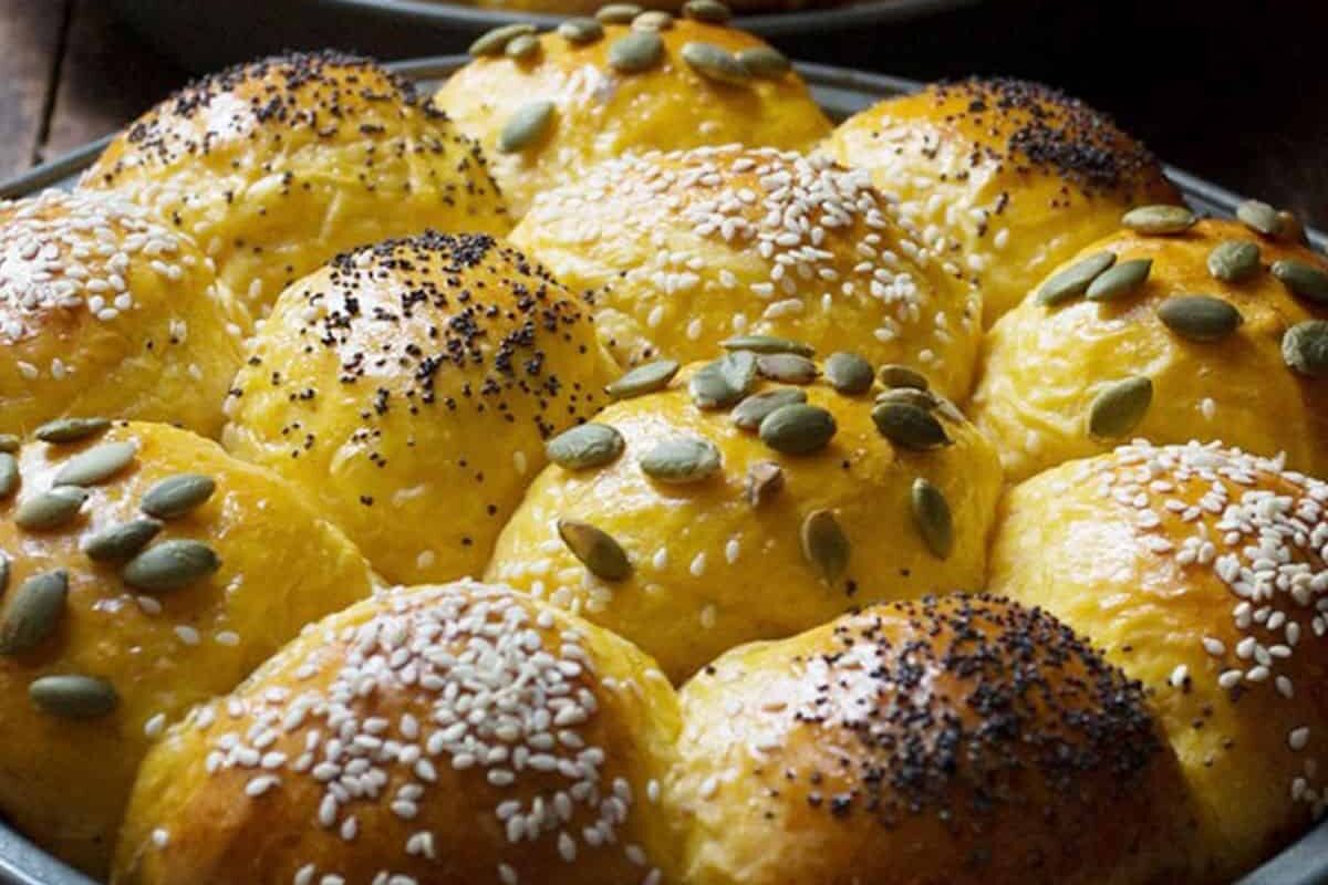 Pumpkin Dinner Rolls - Seasons and Suppers