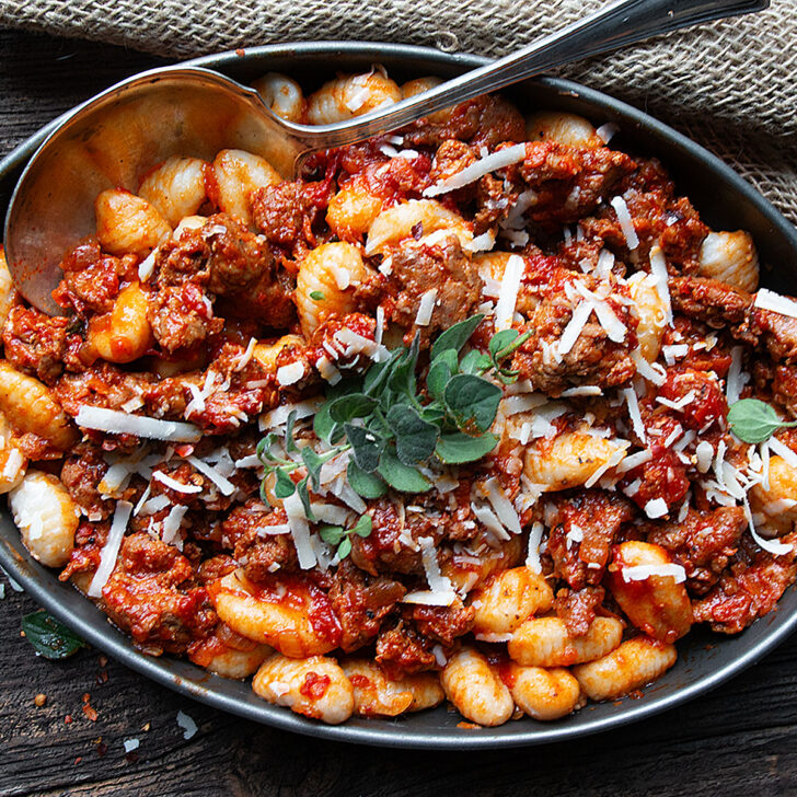 Gnocchi with Chorizo Sausage Sauce - Seasons and Suppers