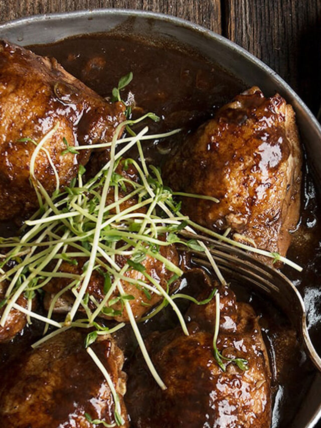 Baked Sticky Orange Chicken Thighs - Seasons and Suppers