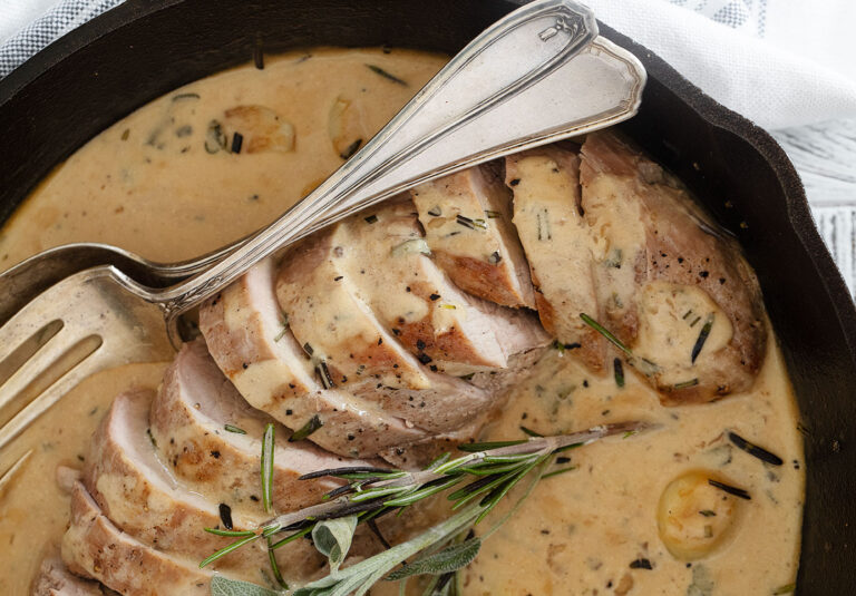 Pork Tenderloin with Creamy Herb and Garlic Sauce - Seasons and Suppers