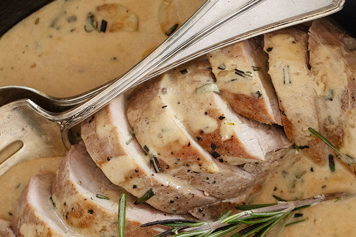 Pork Tenderloin with Creamy Herb and Garlic Sauce - Seasons and Suppers
